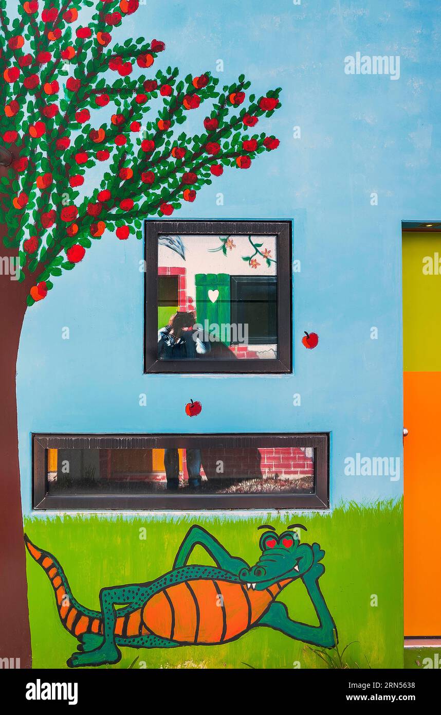 Colourful facade, Olympic Village with painting on the former bungalows ...