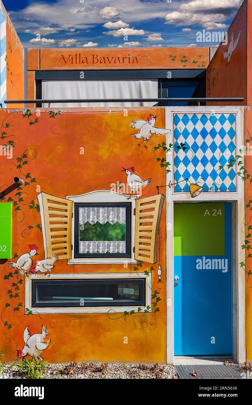 Colourful facade, Olympic Village with painting on the former bungalows ...