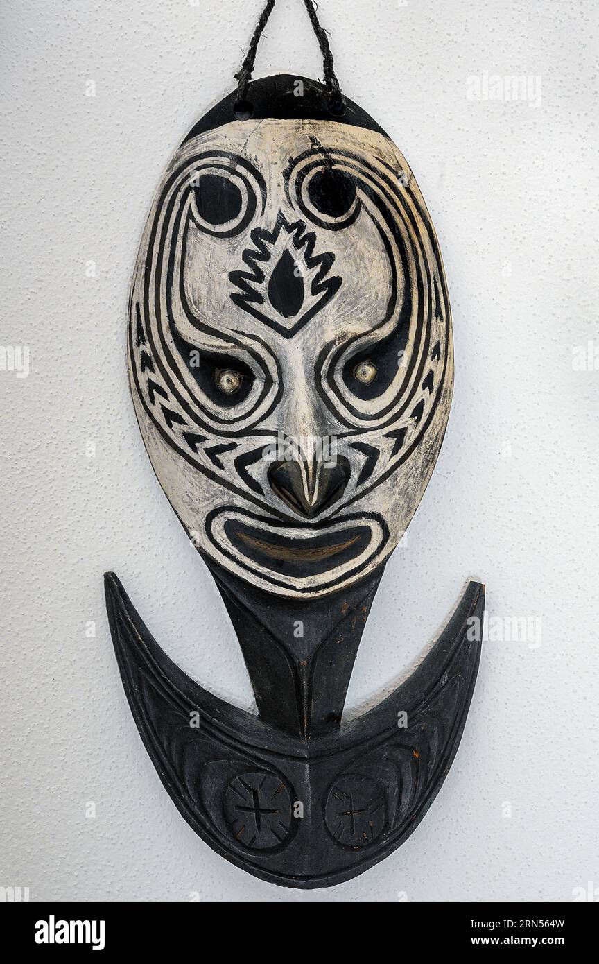 Mythological wooden mask, souvenir from Madang, Papua New Guinea ...