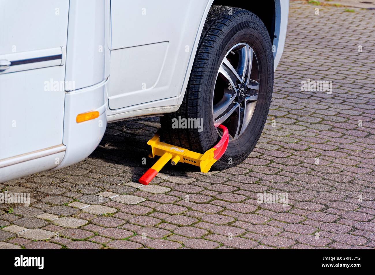 Berlin, Germany - February 22, 2021: Wheel of a car secured against ...