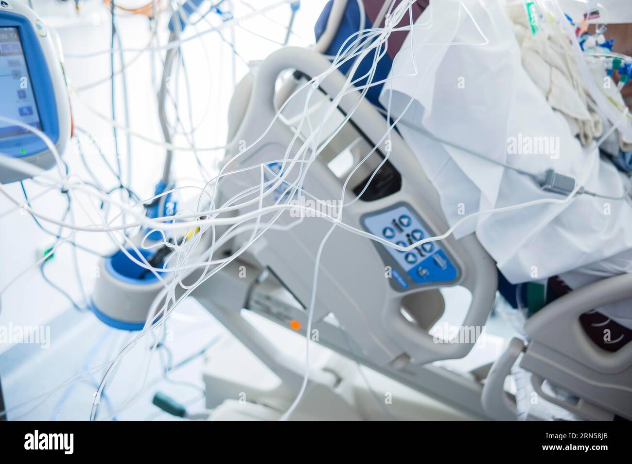 Supply tubes with infusions in an intensive care unit, symbolic image ...