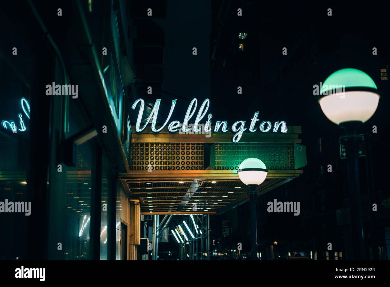 The Wellington Hotel neon sign at night, in Midtown Manhattan, New York Stock Photo - Alamy