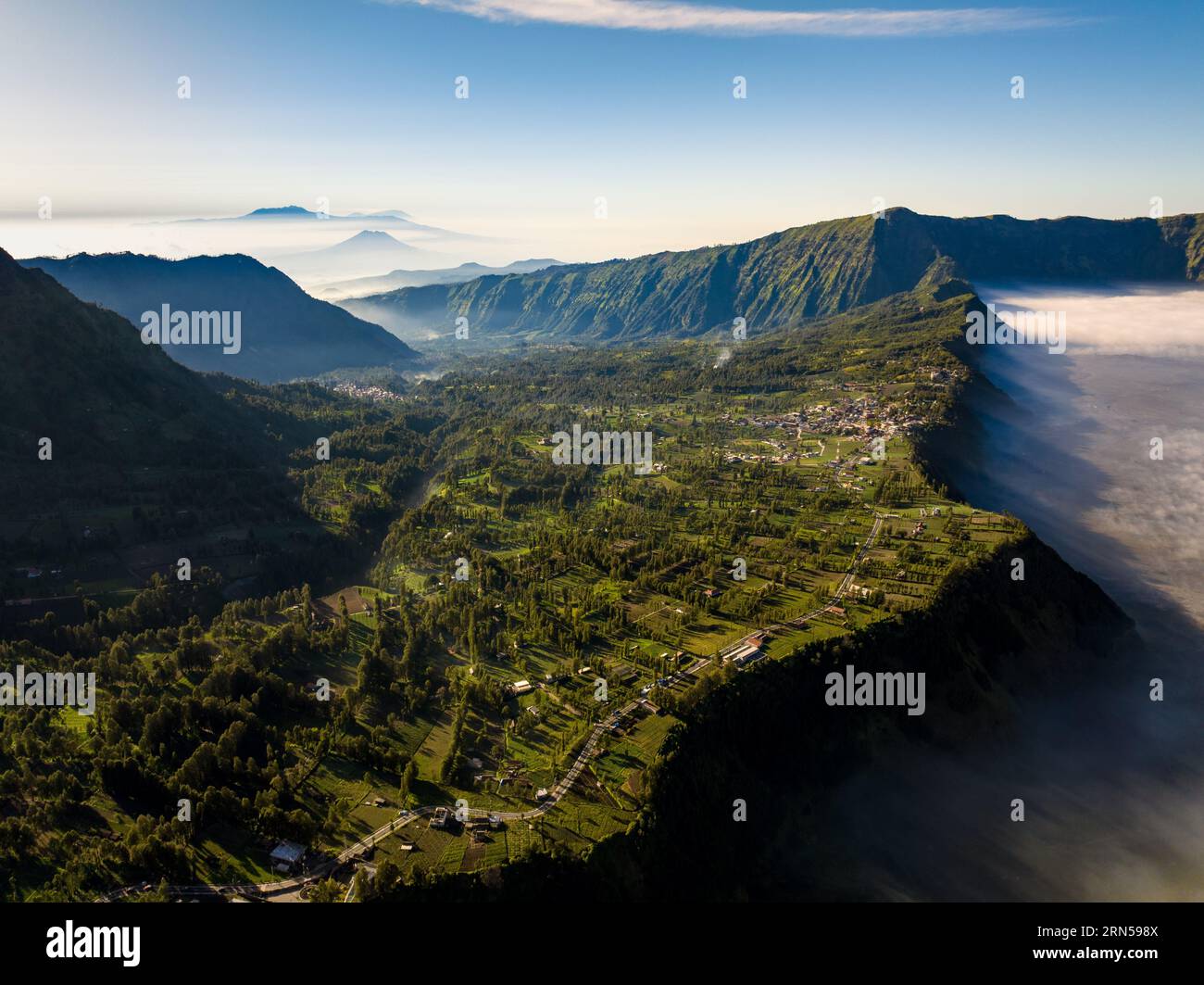 Village and Cliff at Bromo Volcano in Tengger Semeru national park ...