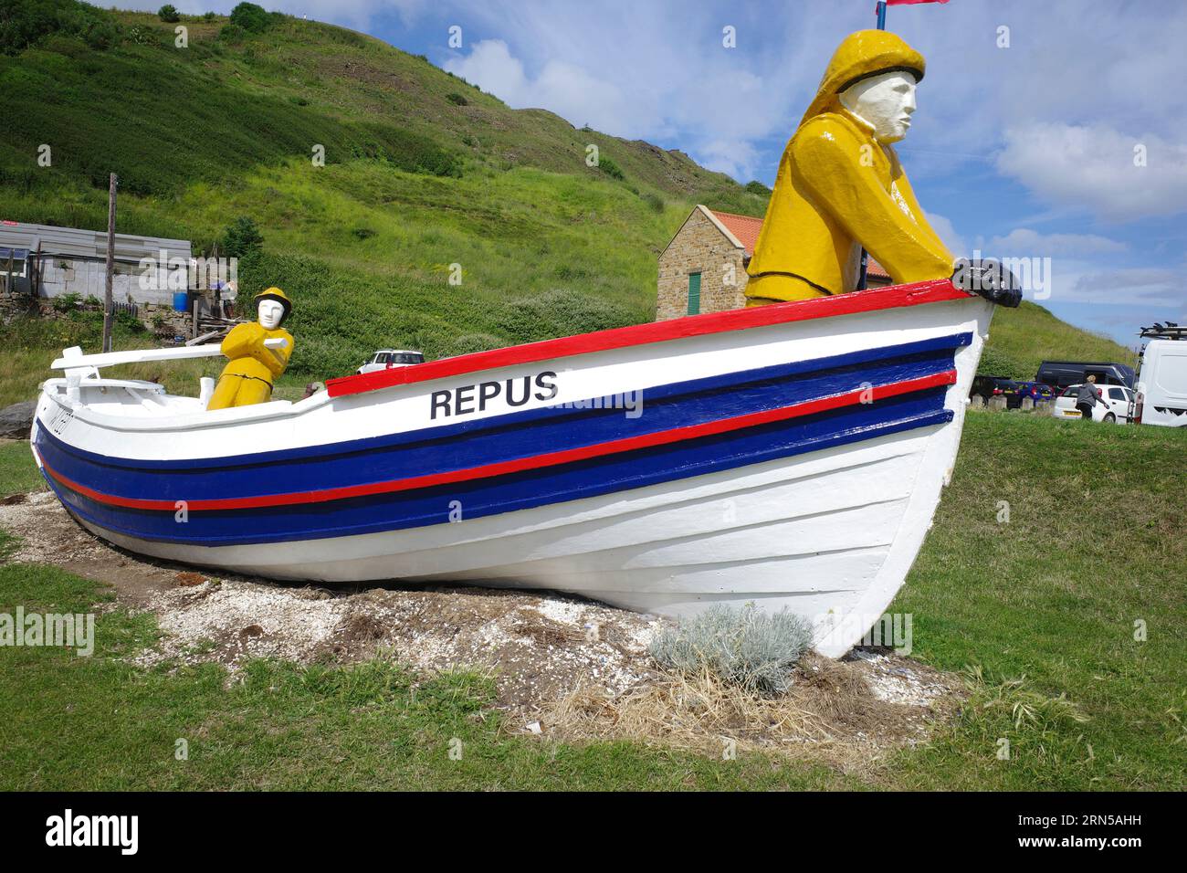 An old fishing boat named Repus as a piece of public art with two ...