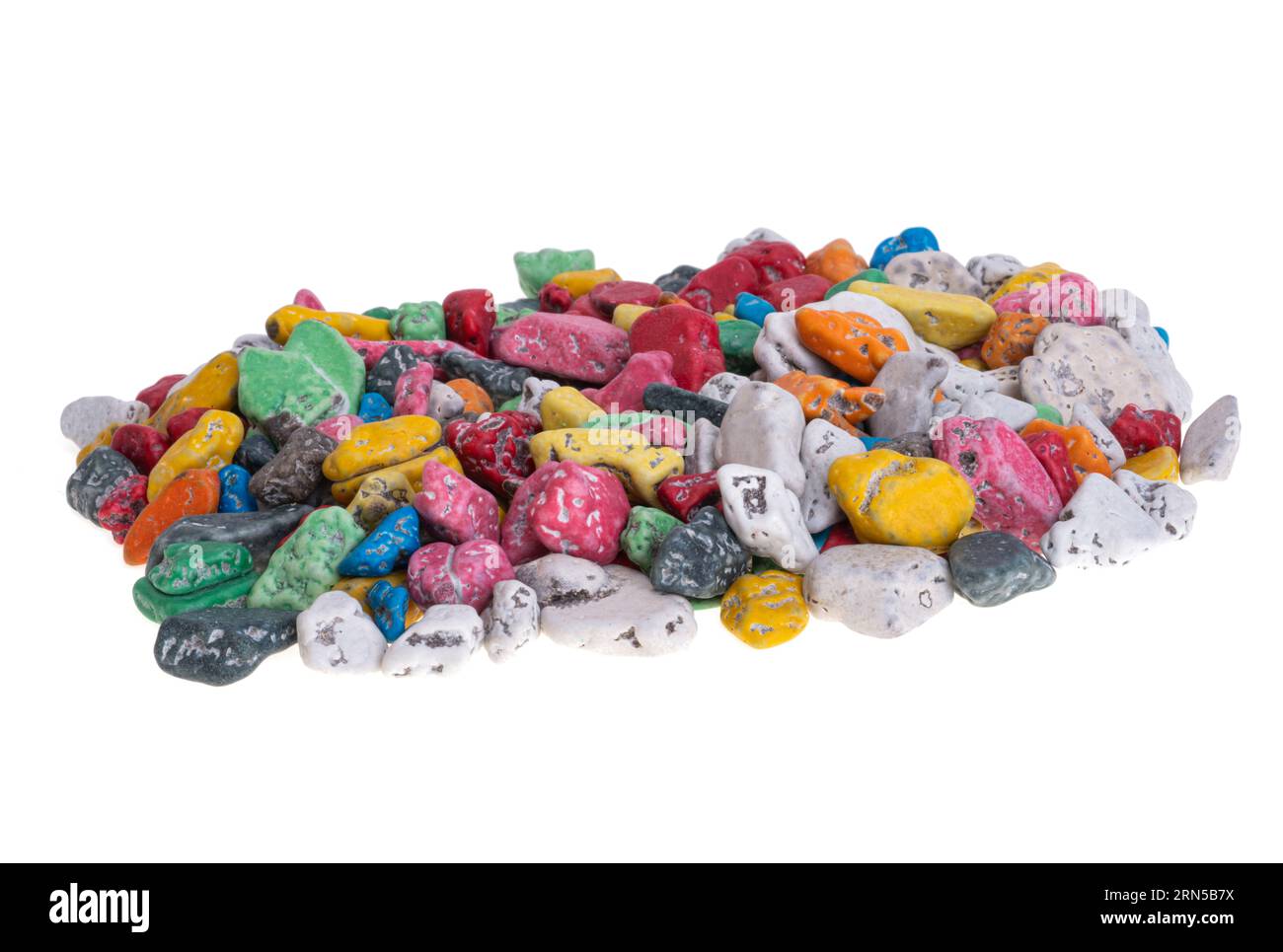 chocolate colored pebbles on a white background Stock Photo - Alamy