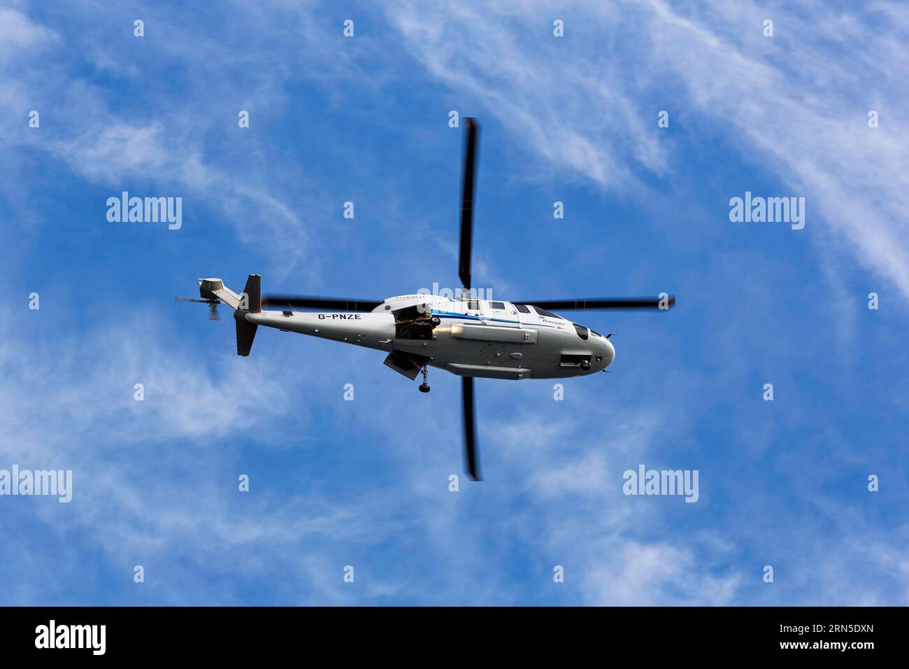Helicopter Starspeed from the Isles of Scilly, blue sky, landing ...