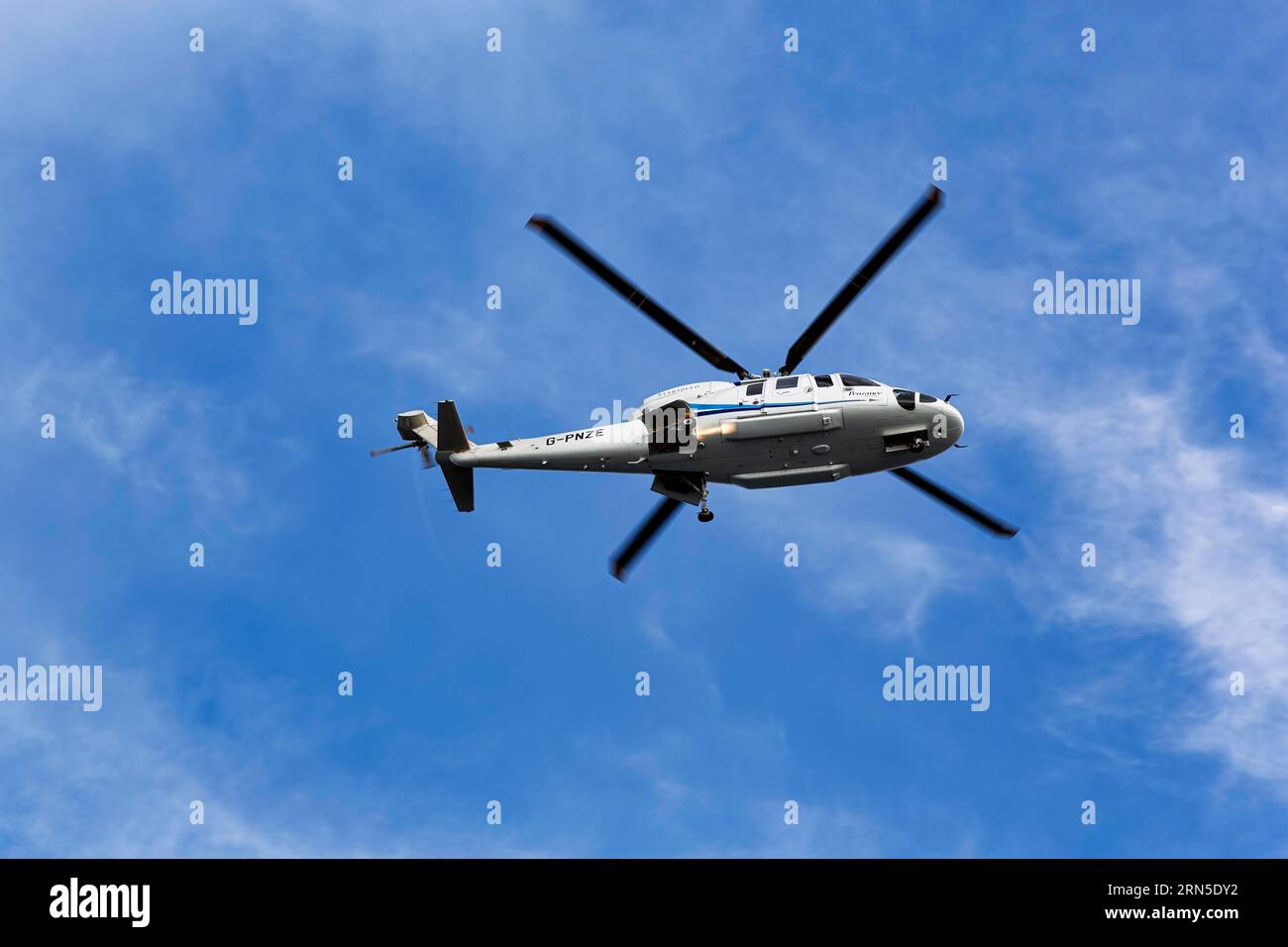 Helicopter Starspeed from the Isles of Scilly, blue sky, landing ...