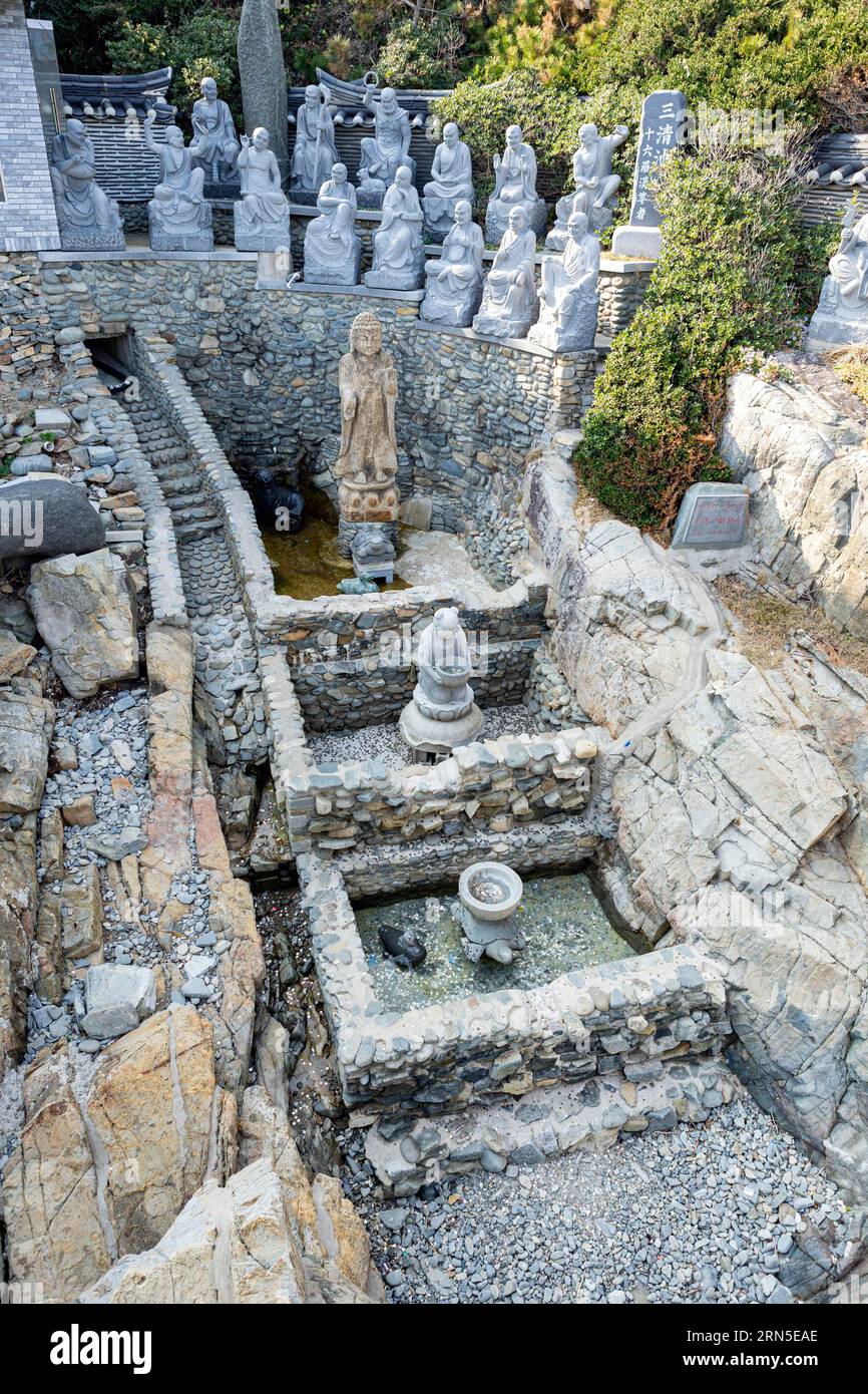 Lucky fountain with stone figures, Haedong Yonggungsa Temple, Busan ...