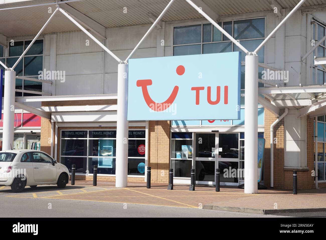 Tui travel agency sign and store in a retail park Stock Photo - Alamy