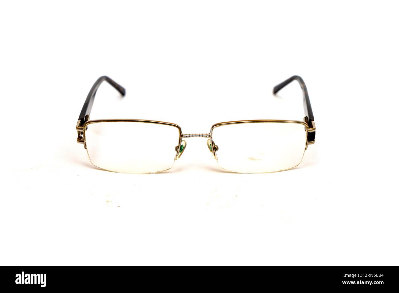 shortsighted or nearsighted eyeglasses on white background, Selective ...