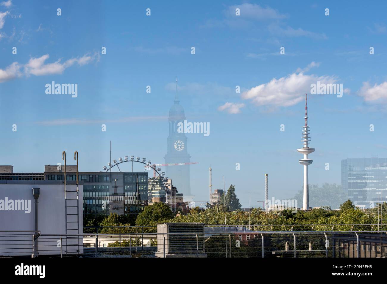 View from a window of the dancing towers, Ferris wheel, television ...
