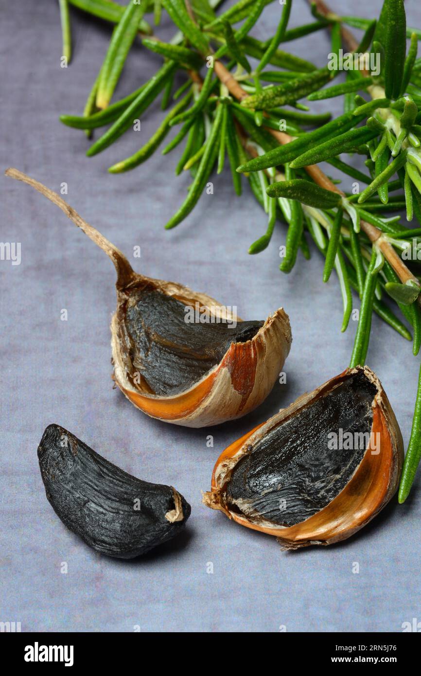 Black fermented garlic, garlic cloves Stock Photo - Alamy