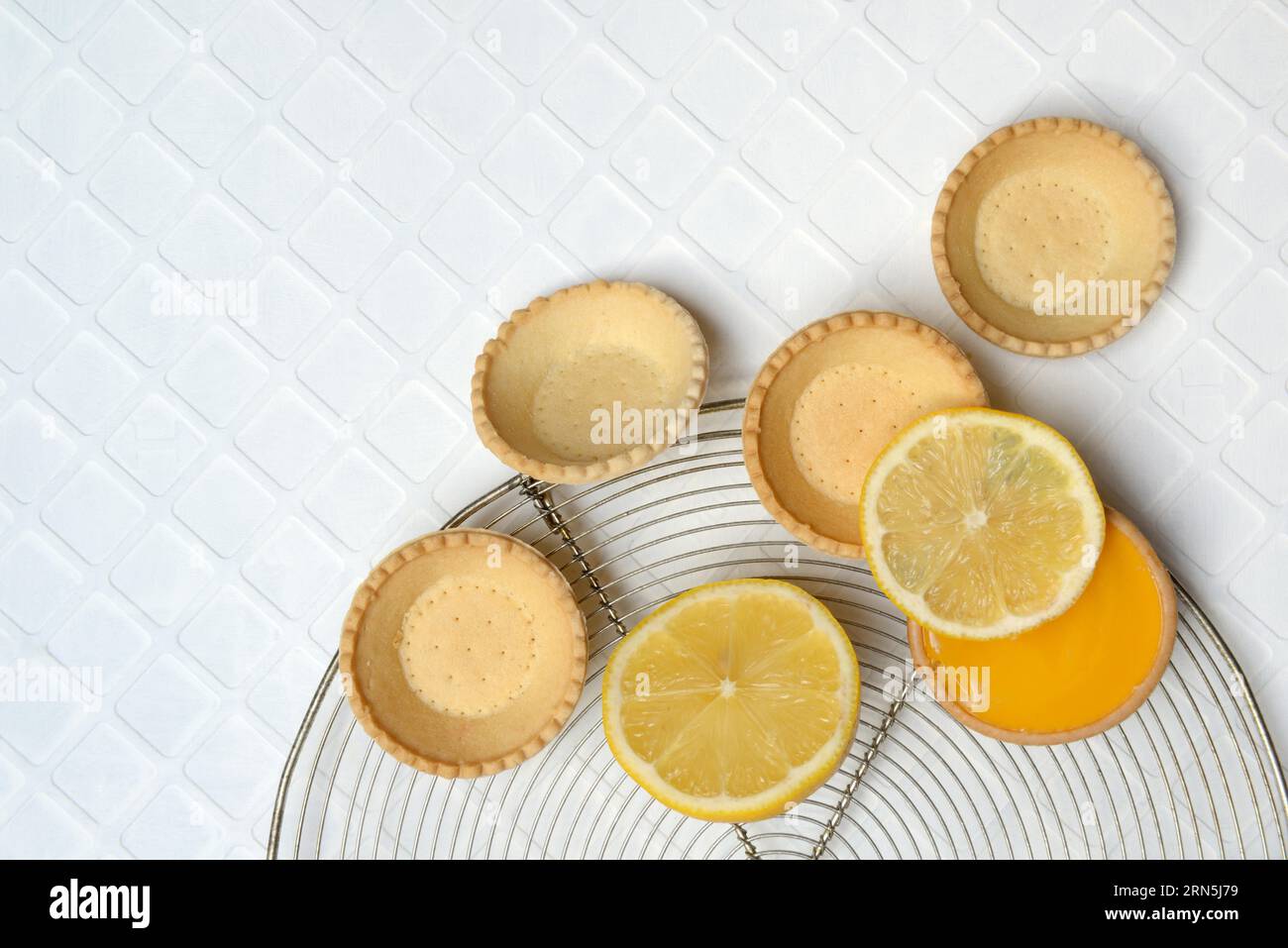 Lemon tartlet and pre-made tartlet base, tartelette, lemon Stock Photo ...