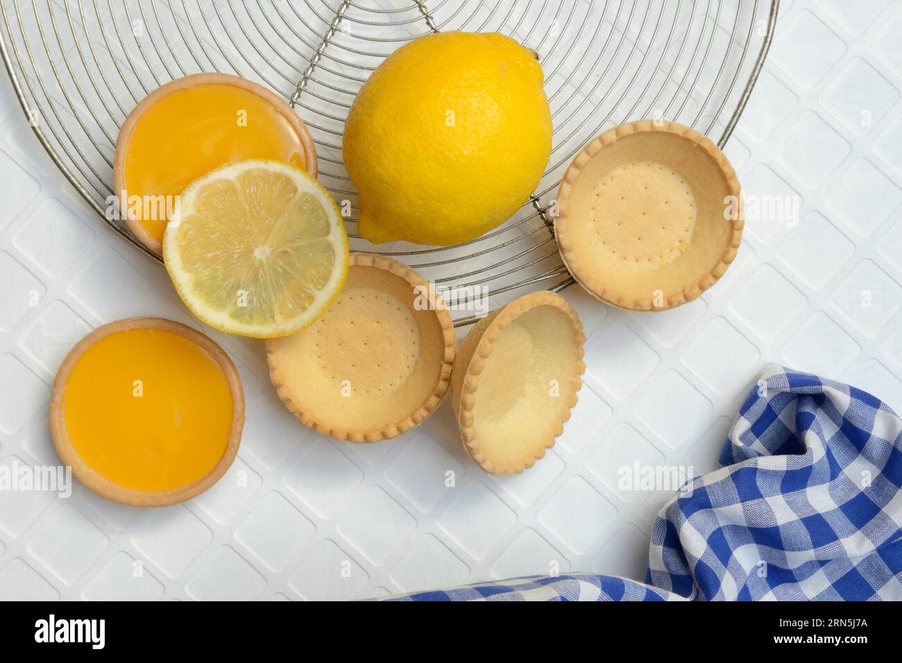 Lemon tartlet and pre-made tartlet base, tartelette, lemon Stock Photo ...