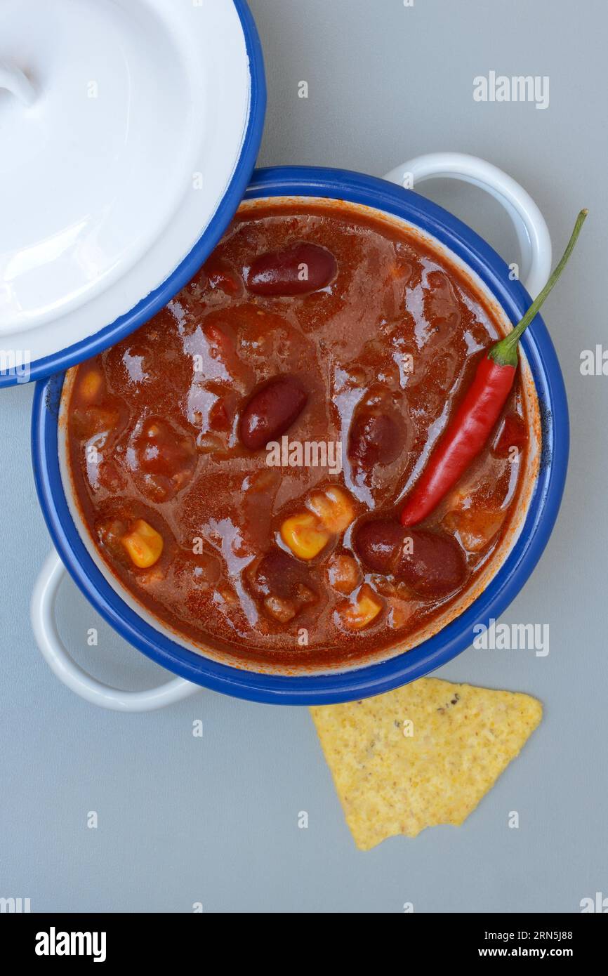 Chilli con carne, potted bean stew with taco Stock Photo - Alamy