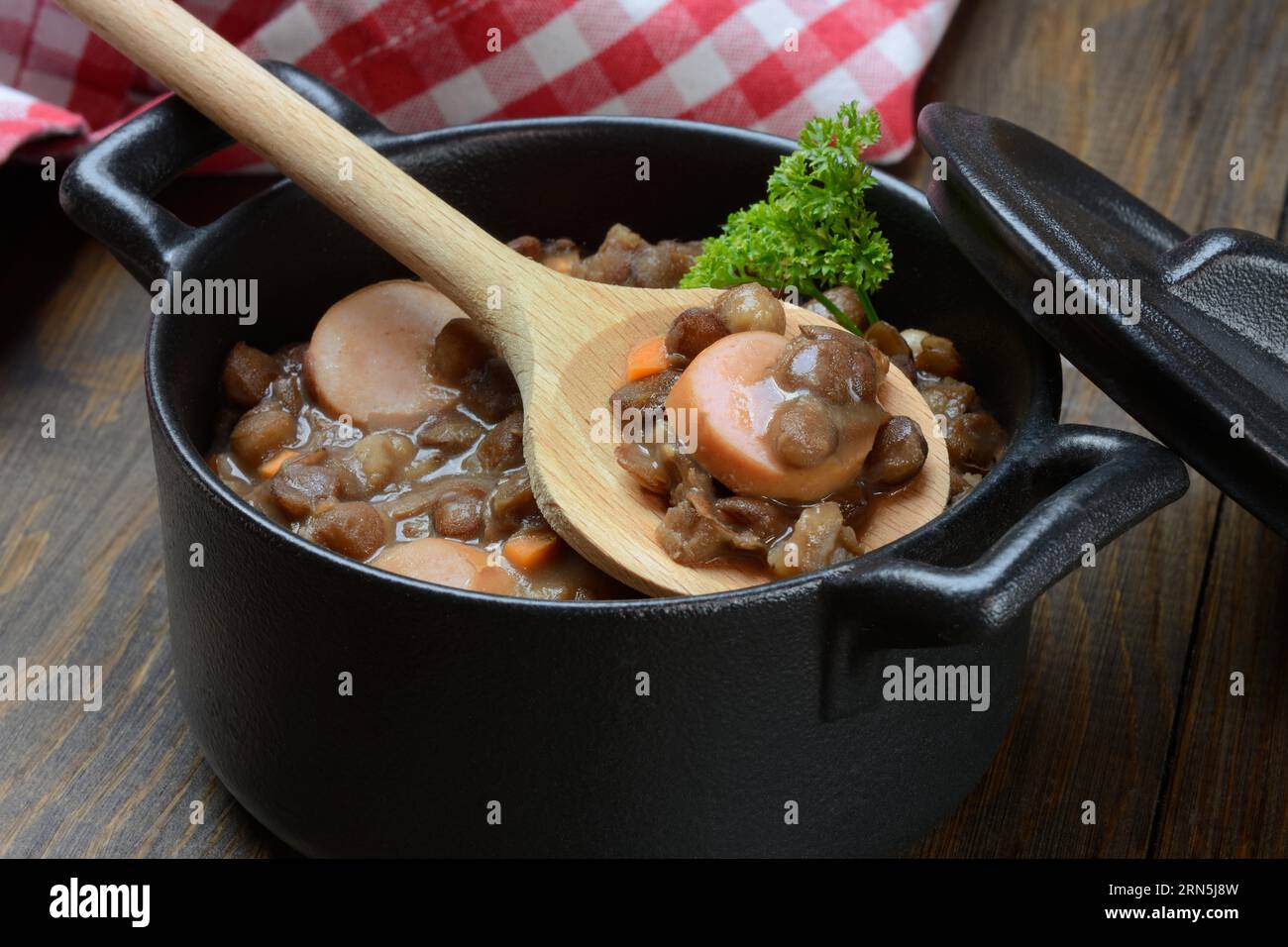 Lentil (Lens culinaris) dish with sausage slices in pots, lentil Stock ...