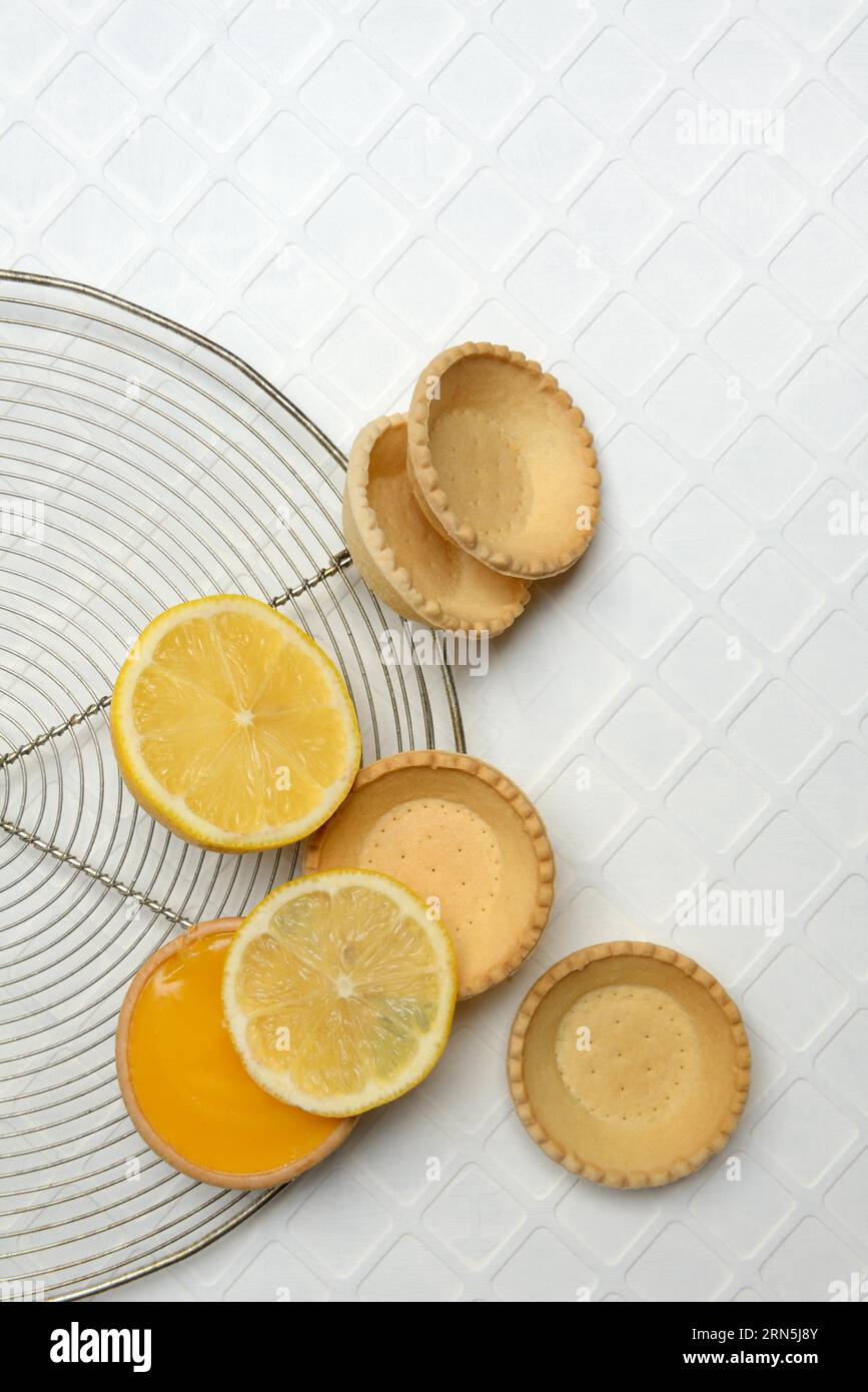 Lemon tartlet and pre-made tartlet base, tartelette, lemon Stock Photo ...
