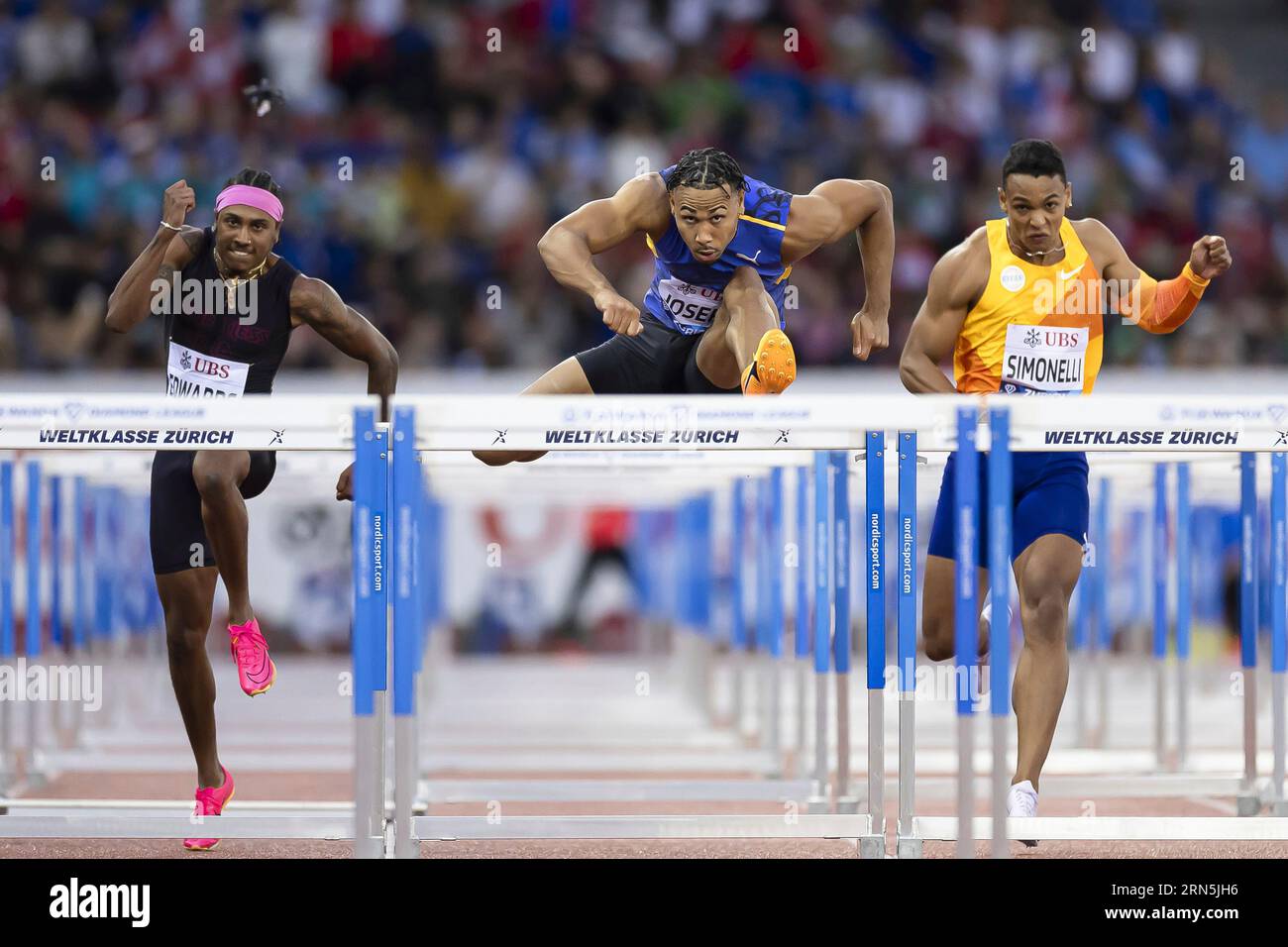 Jason Joseph of Switzerland, center, competes to win the Men's 110m ...