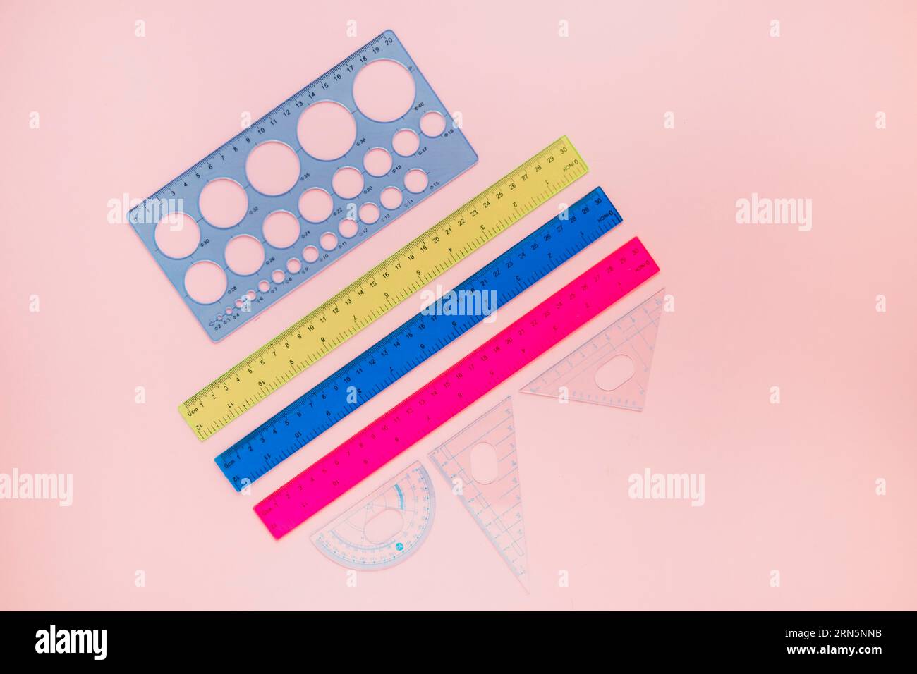 Rulers alidad laid middle Stock Photo - Alamy