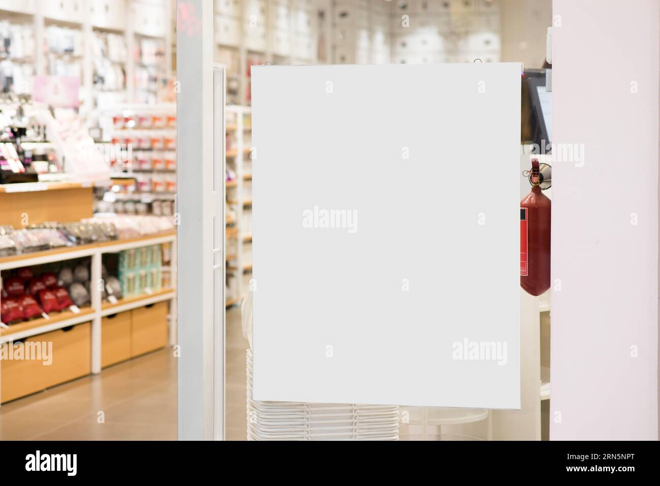 White billboard stuck window display Stock Photo - Alamy