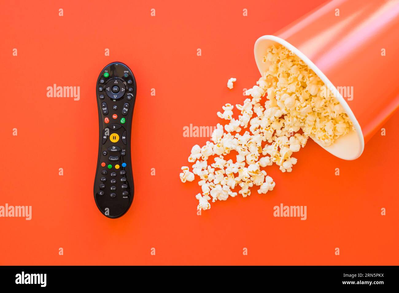 Bucket popcorn remote control Stock Photo - Alamy