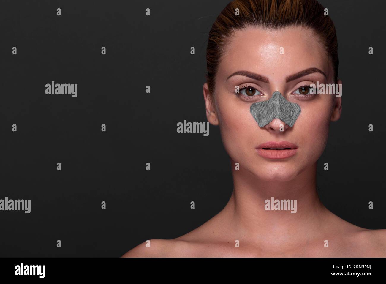 Cute young girl with nose mask Stock Photo - Alamy