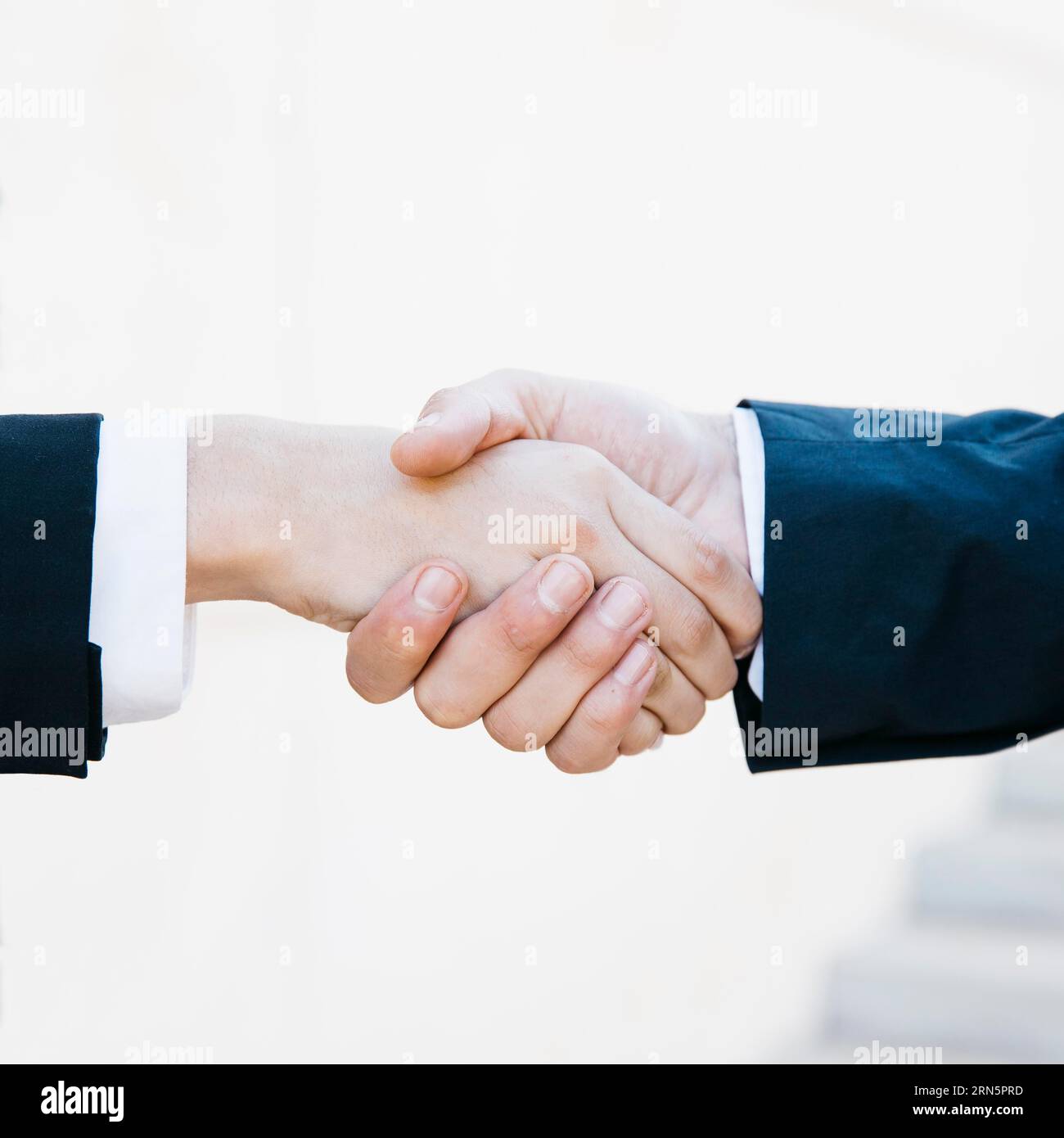 Business handshake teamwork achievement hi-res stock photography and images - Alamy