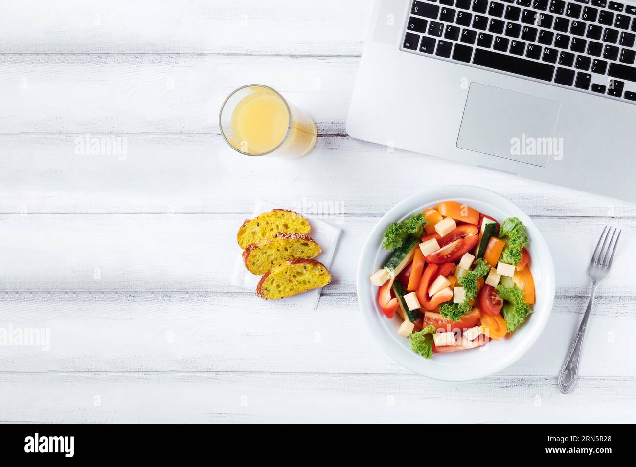 Delicious lunch break office desk Stock Photo - Alamy
