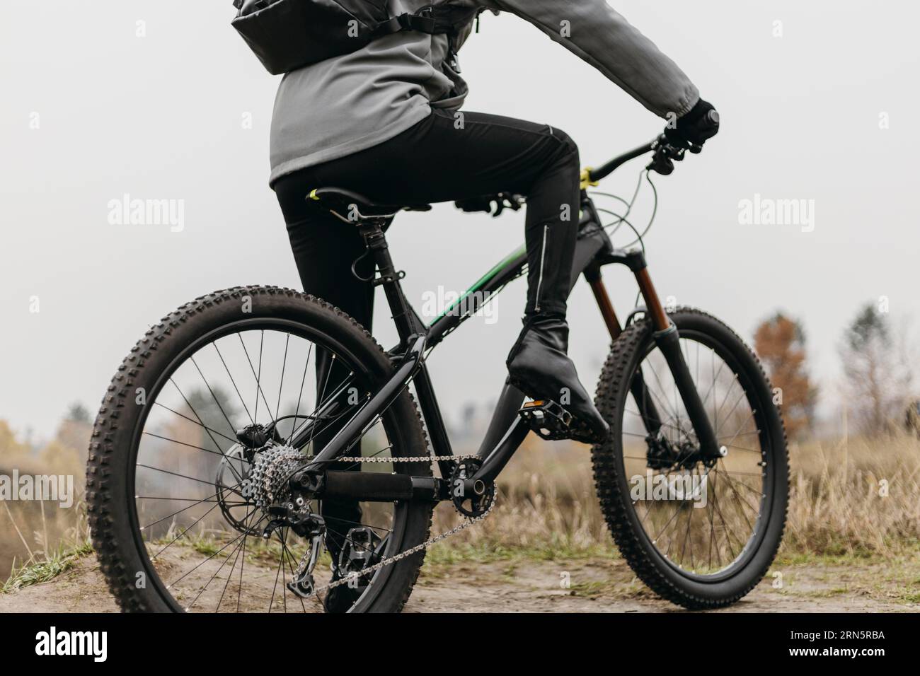 Front view man riding bike Stock Photo - Alamy