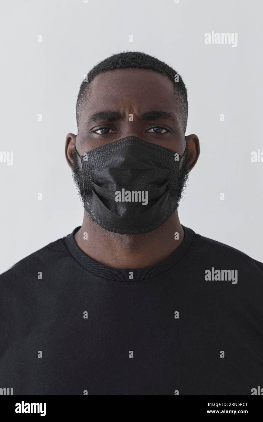 Front view black person wearing mask Stock Photo - Alamy