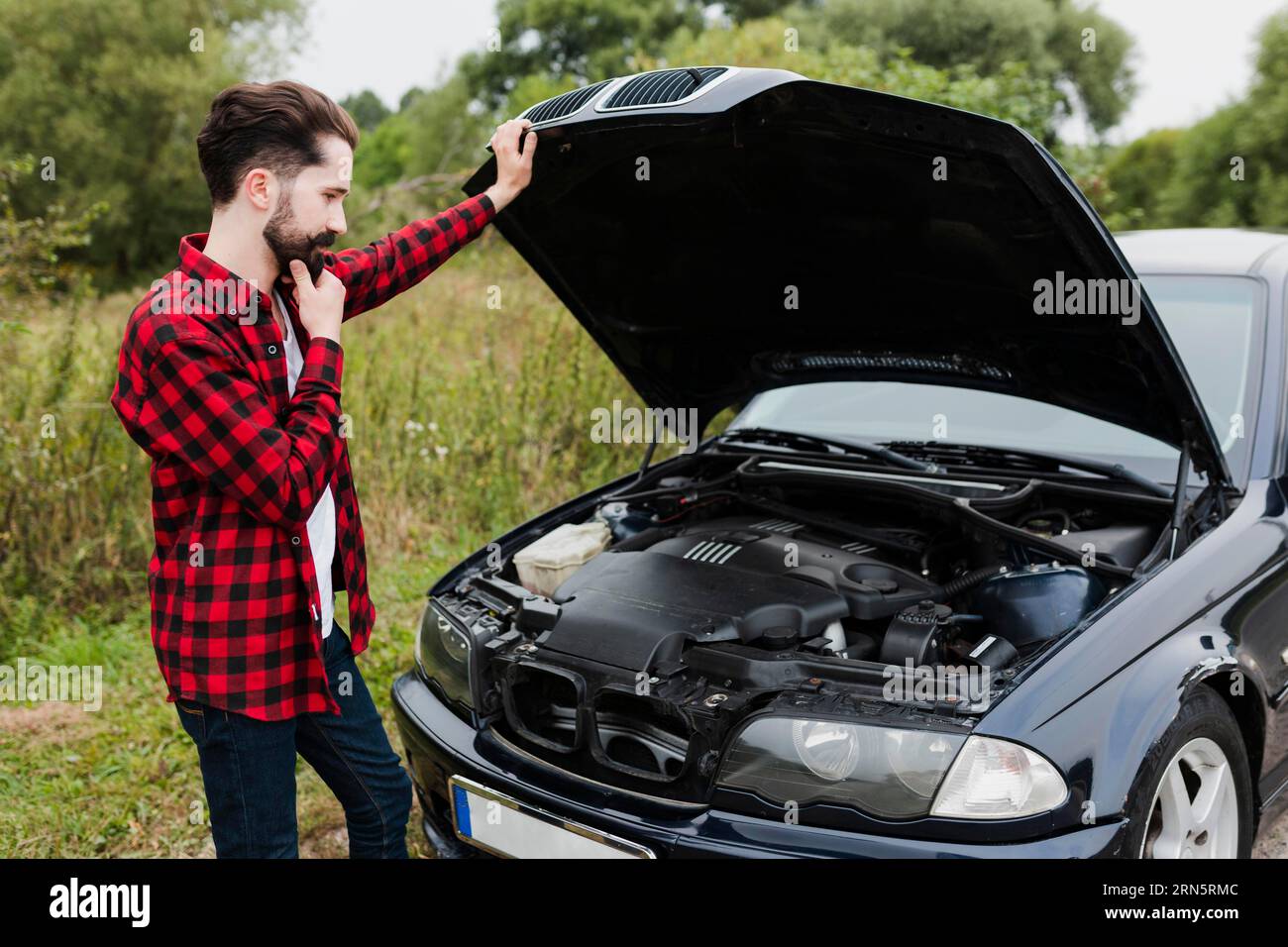 Open car hood hi-res stock photography and images - Alamy