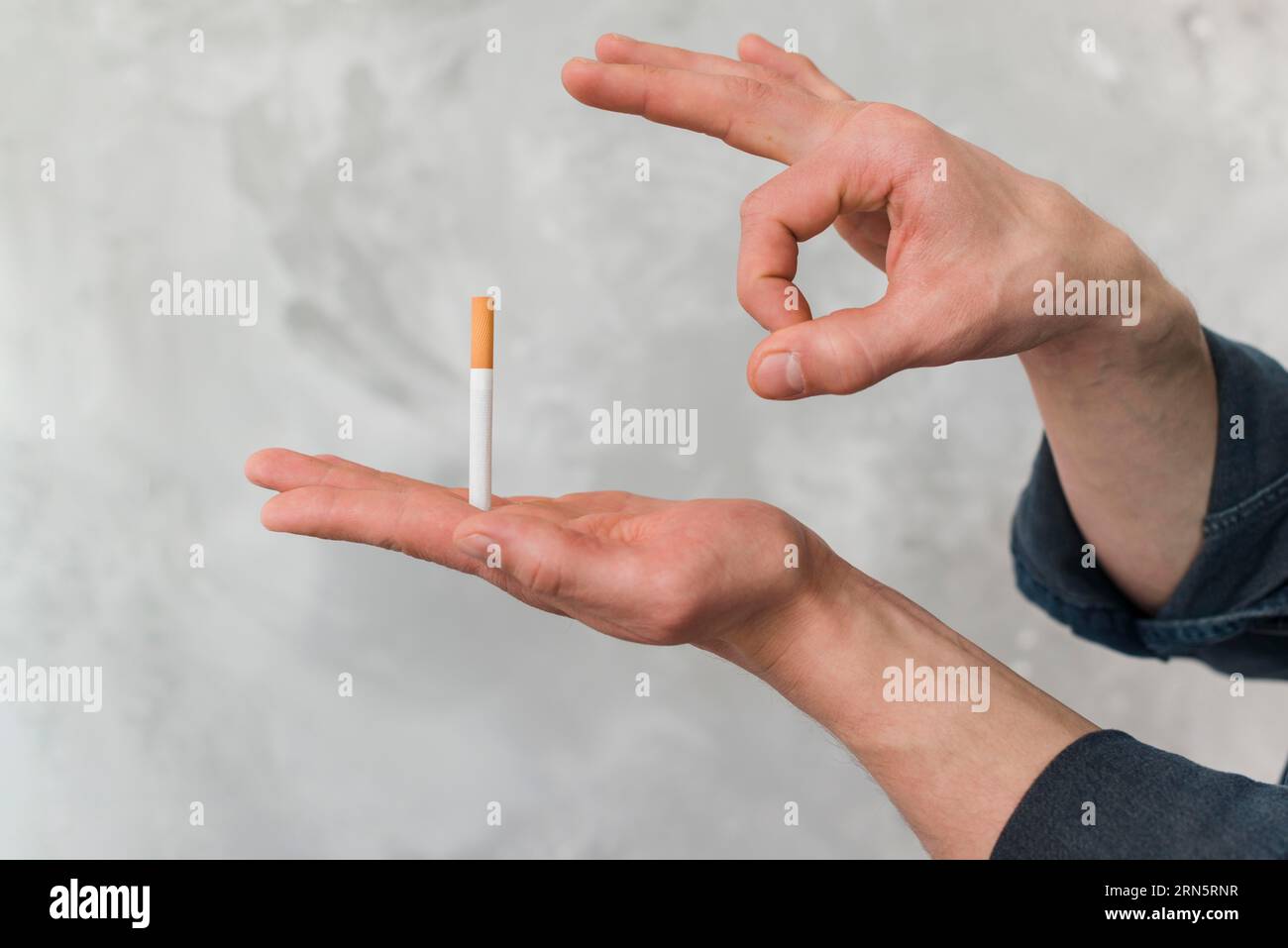 Finger cigarette hi-res stock photography and images - Alamy