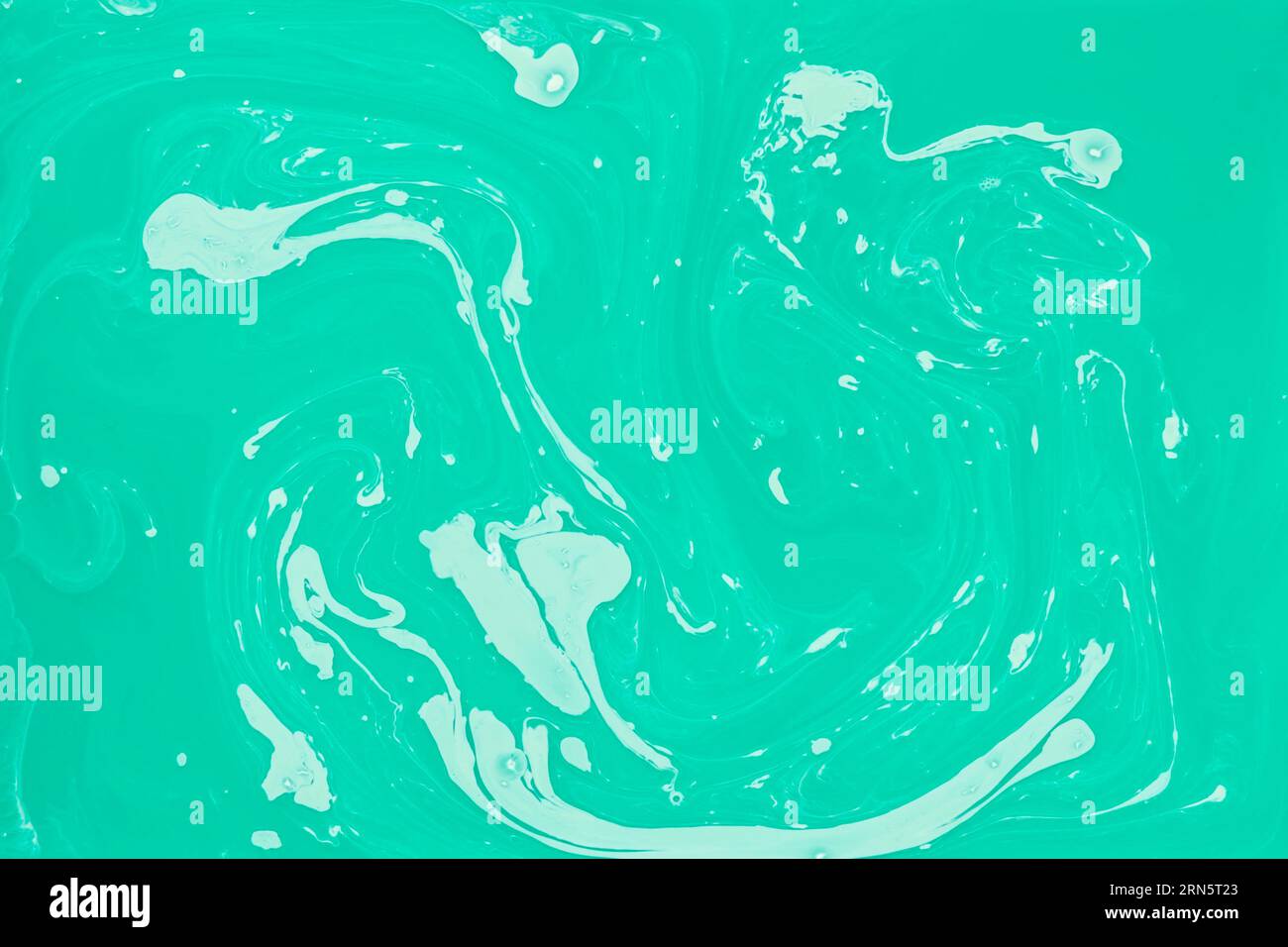 Overhead view paint green color backdrop Stock Photo - Alamy