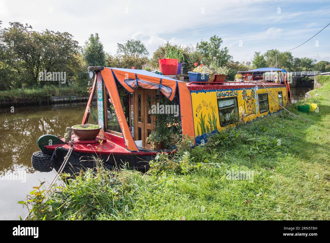 Tilly Flood, a colourful narrowboat on the Leeds and Liverpool canal ...