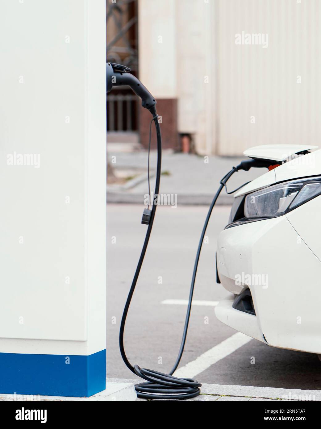 Side view car being charged electric vehicle charging station Stock ...