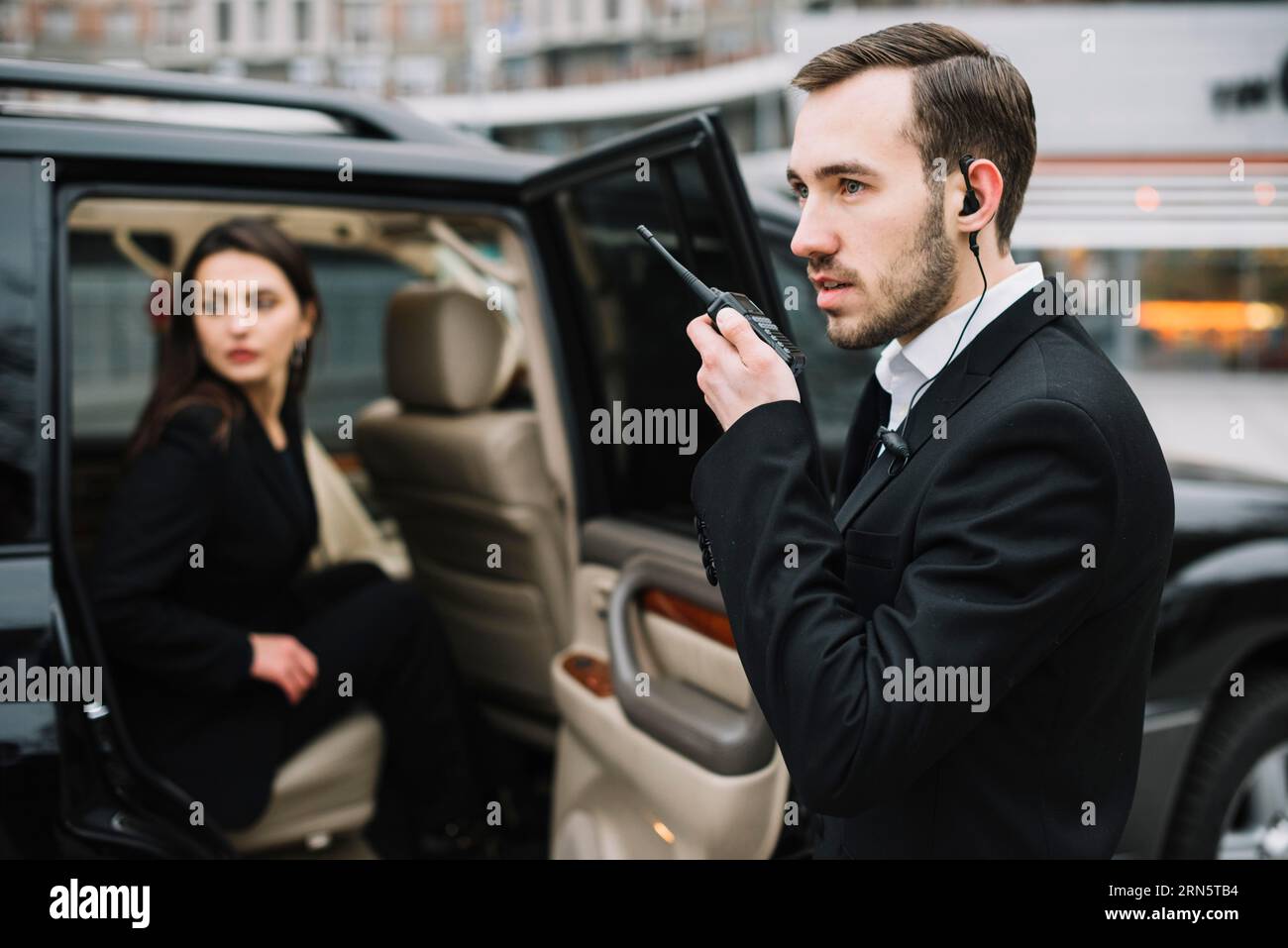 Side view safety man monitorization Stock Photo - Alamy