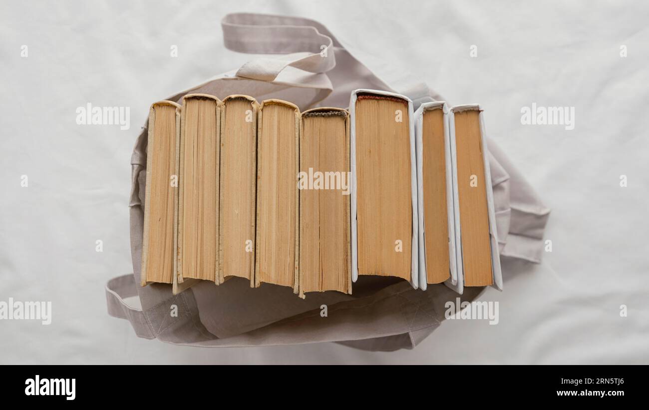 Top view books stack bag Stock Photo - Alamy