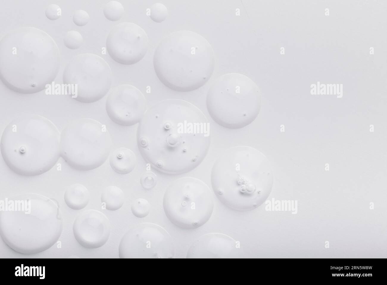 White water drop background Stock Photo - Alamy