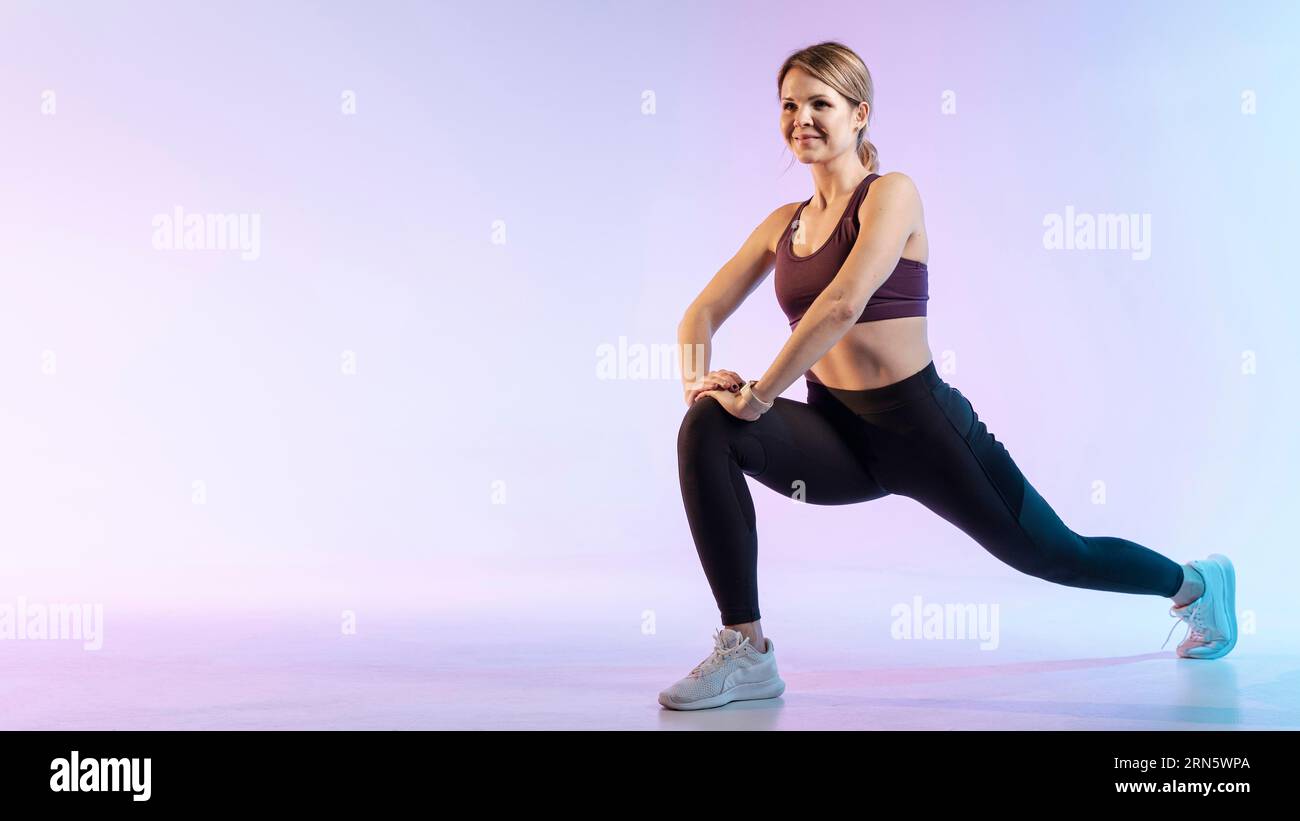 Copy space woman stretching before work out Stock Photo - Alamy