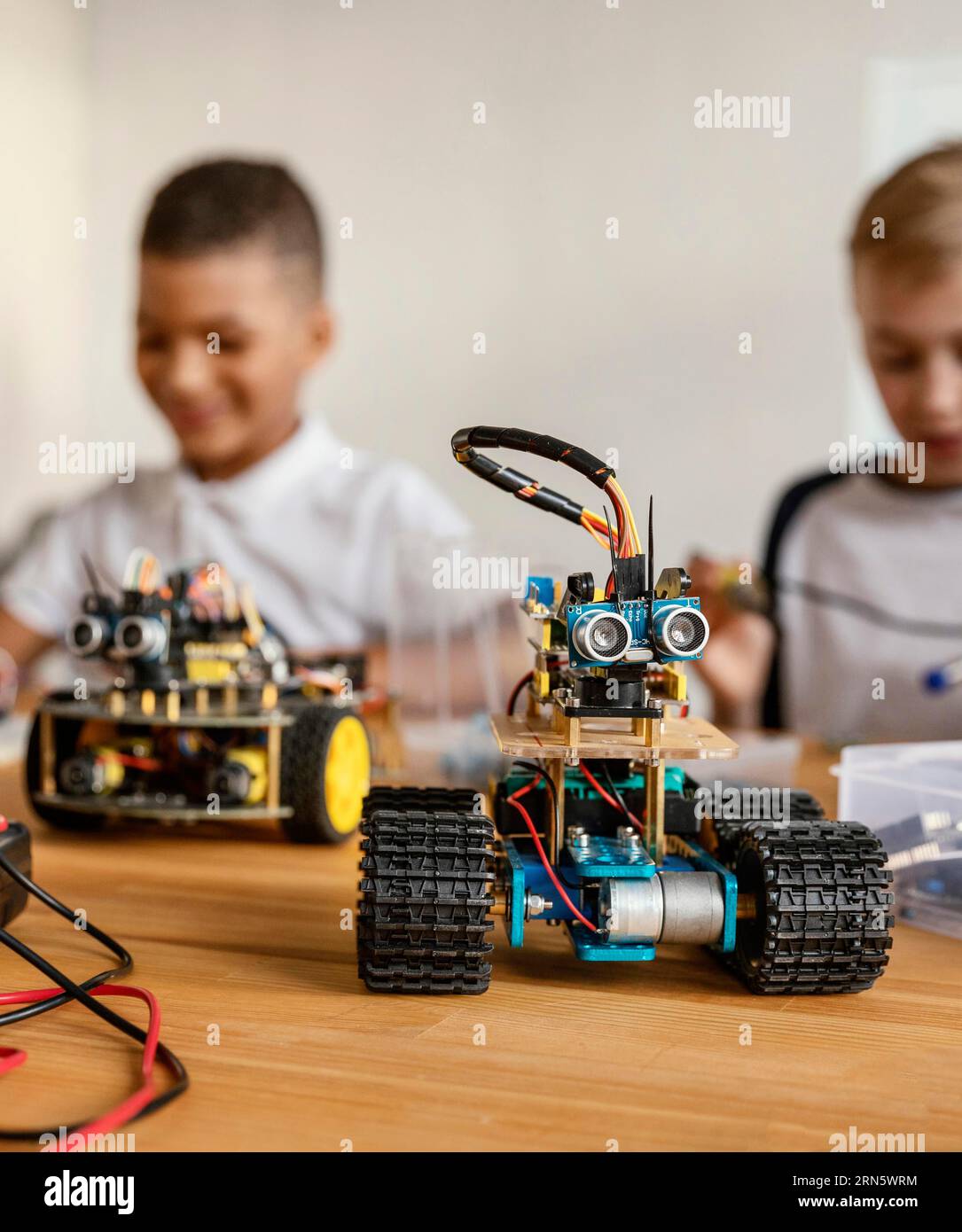 Children making robot Stock Photo - Alamy