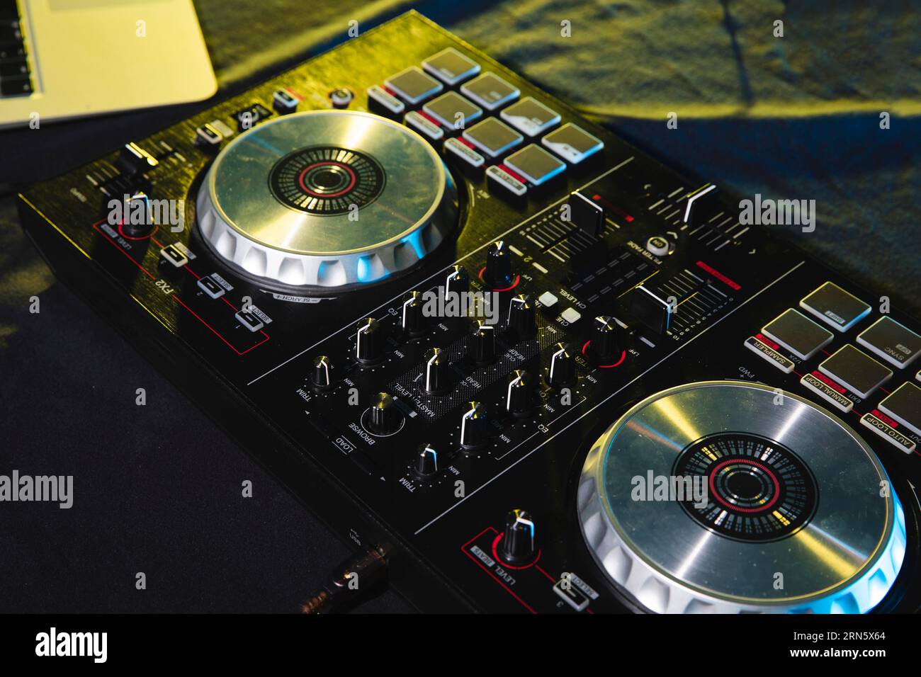 Dj mixing soundboard panel control Stock Photo - Alamy