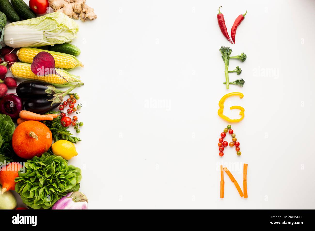 Flat lay vegan lettering made out vegetables Stock Photo - Alamy