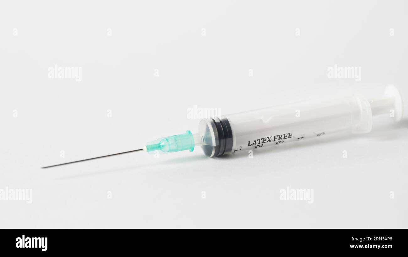 High angle syringe white background Stock Photo - Alamy