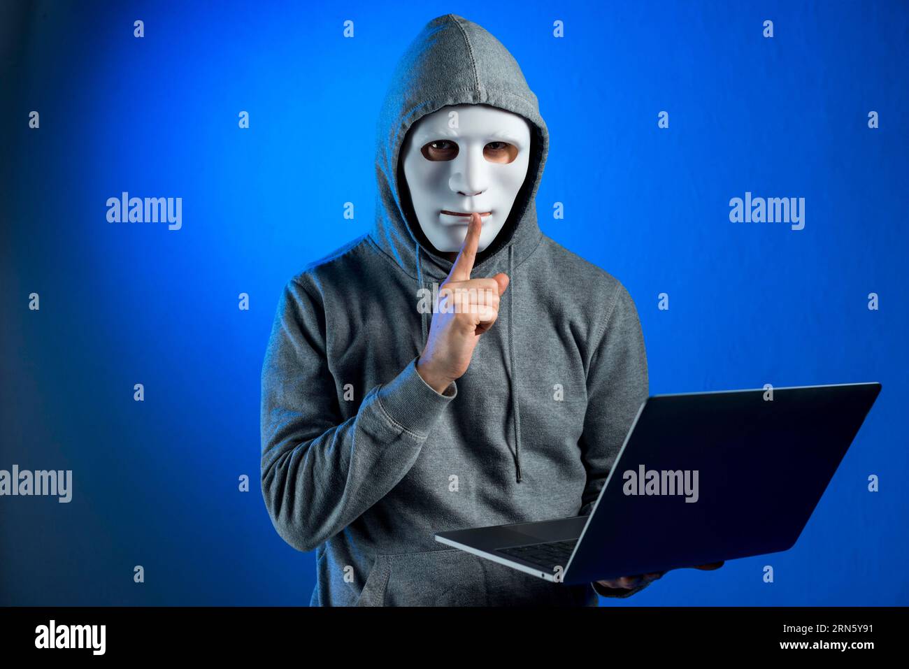 Hacker costume hi-res stock photography and images - Alamy