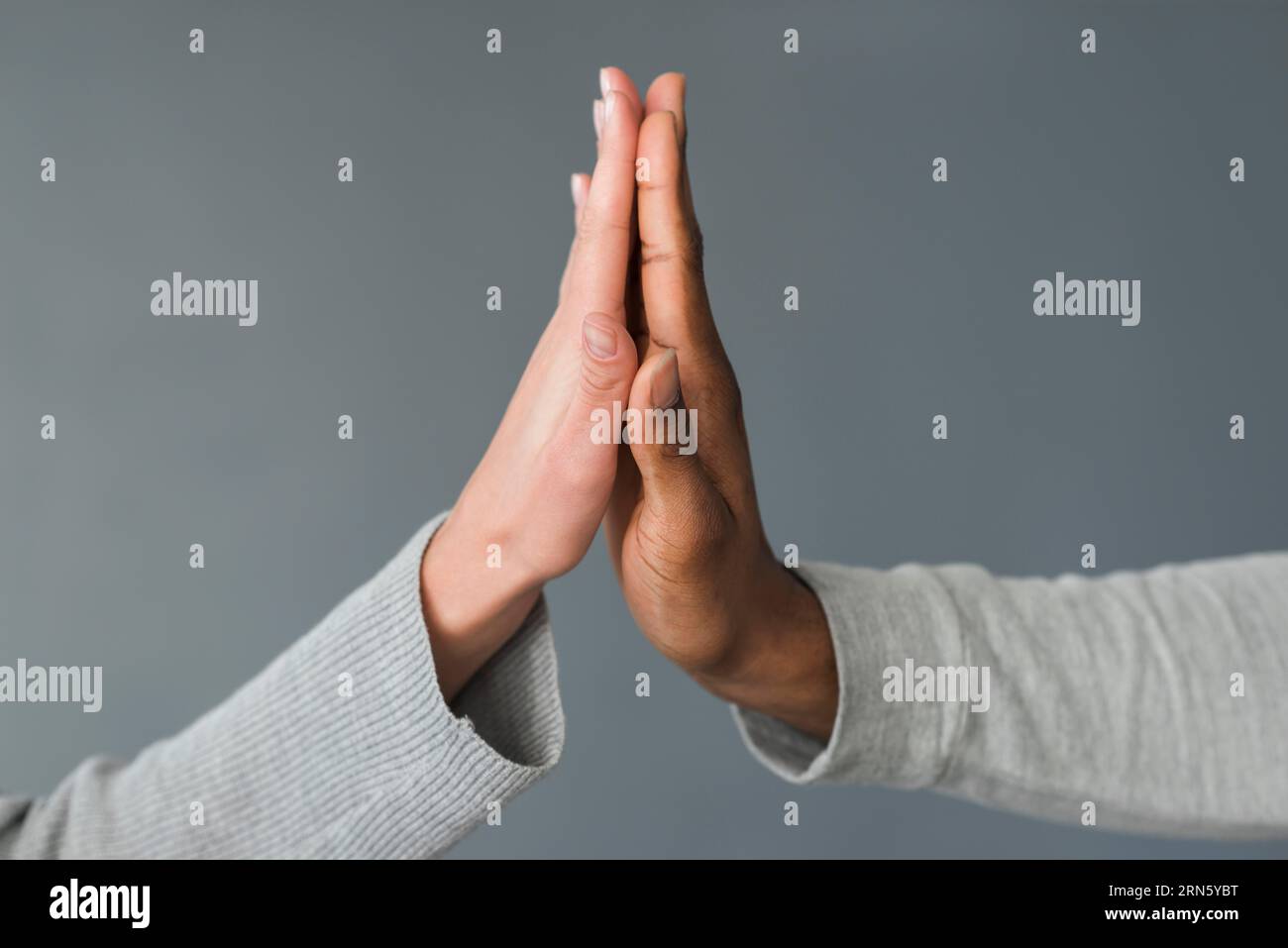 People doing high five Stock Photo - Alamy