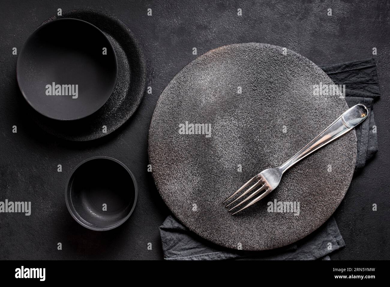 Top view assortment black tableware Stock Photo - Alamy