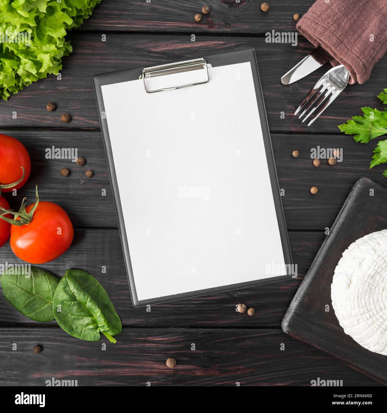 Top view empty menu with tomatoes spinach Stock Photo - Alamy