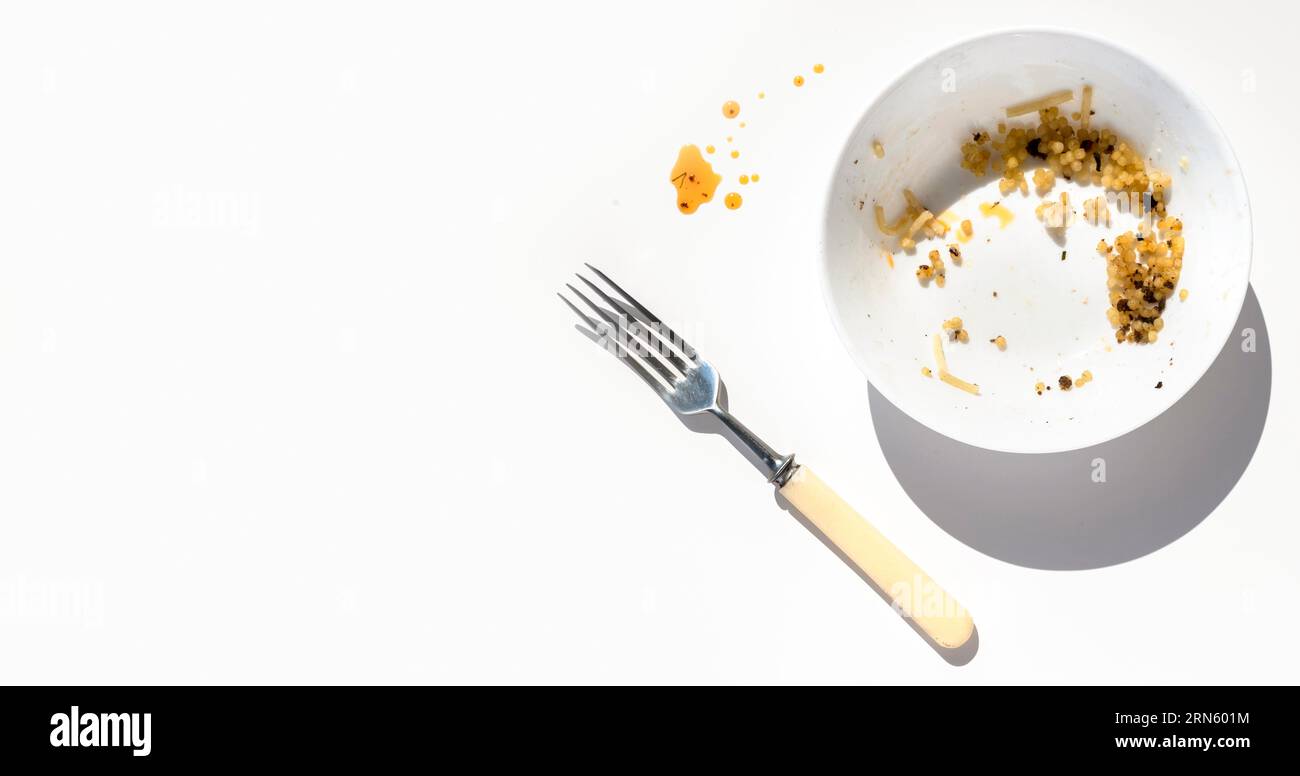 Top view dirty plate with food leftovers Stock Photo - Alamy