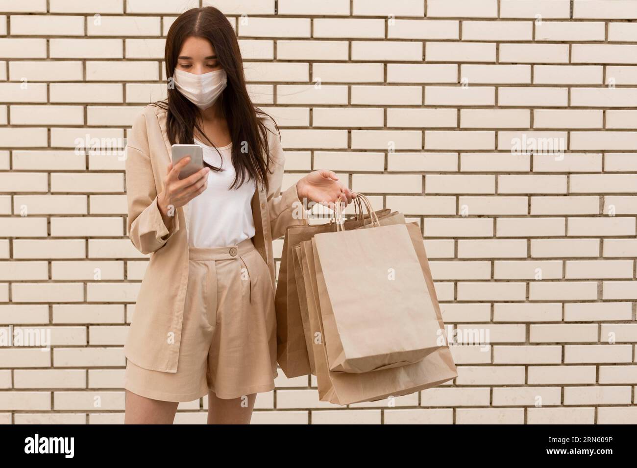 Lady wearing mask bags hi-res stock photography and images - Alamy