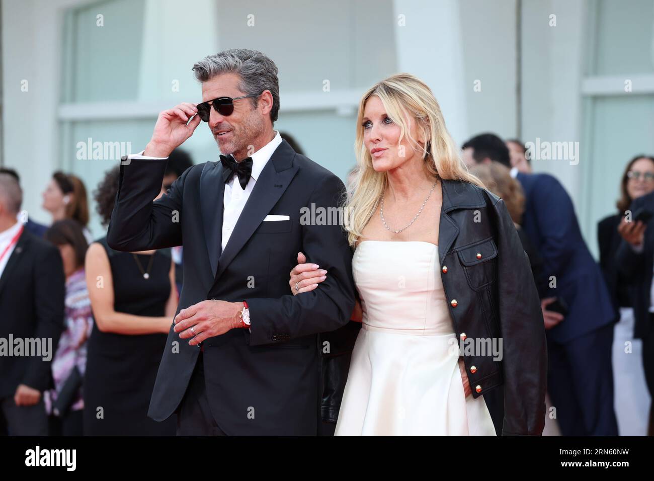 Lido Di Venezia, Italy. 31st Aug, 2023. Patrick Dempsey and Jillian Fink attend a red carpet for ...